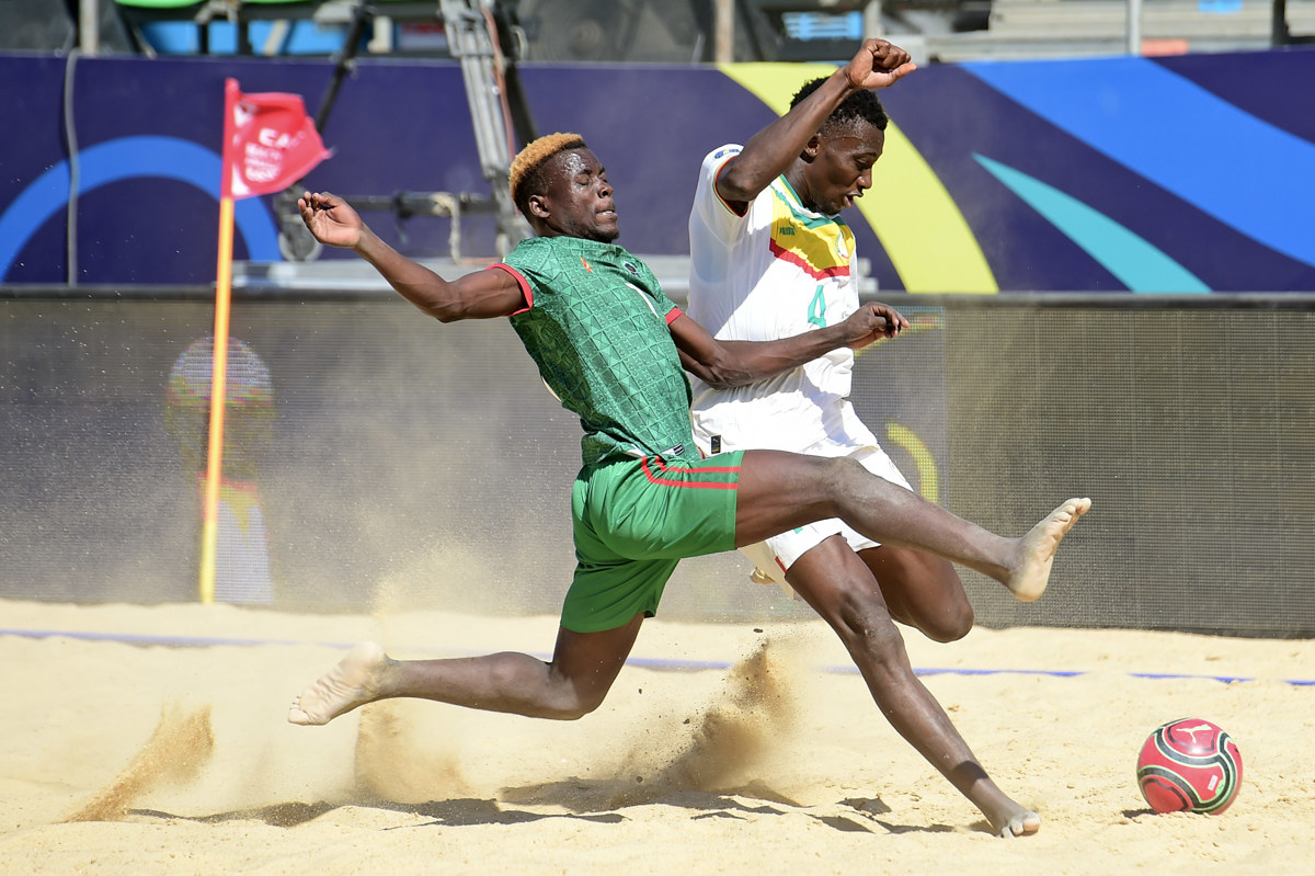 Reigning champions Senegal secure first win
